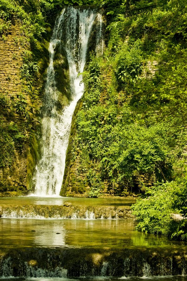 Waterfall in countryside stock image. Image of blur, greenery - 20711433