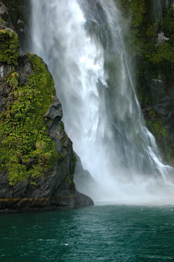 Waterfall Crashing into Ocean Stock Image - Image of clean, majesty ...
