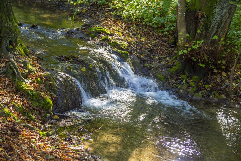 Waterfall with creek stock photo. Image of nature, outdoor - 237491594