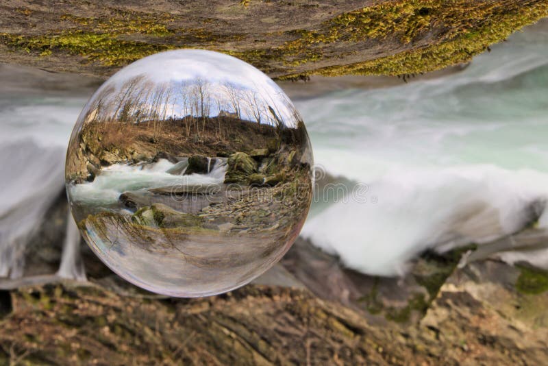 Waterfall in crystal ball stock image. Image of flowing - 67412311