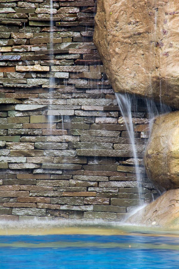 Waterfall Decorate in the Pool and Blue Tone Stock Photo - Image of ...