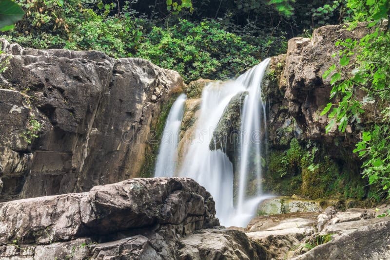 Waterfall in deep forest stock photo. Image of reflection - 7545104
