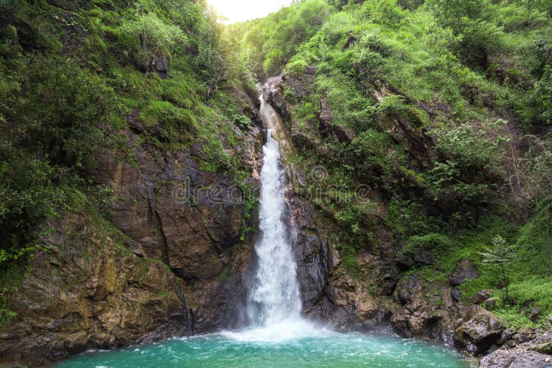 Waterfall stock image. Image of rays, rain, park, beautiful - 258893657