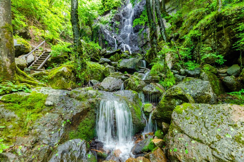 Waterfall in Deep Mountain with Large Rocks in Spring Stock Photo ...