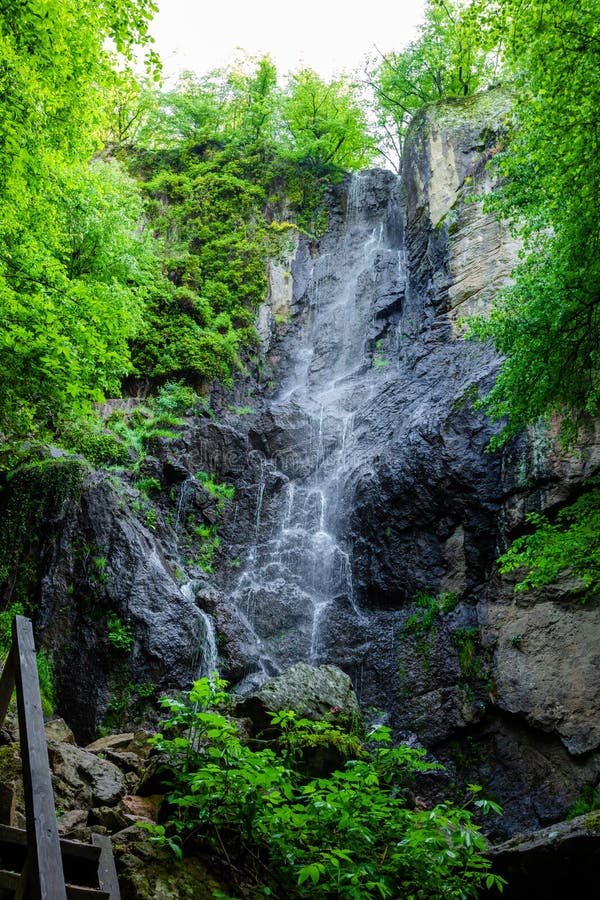 Waterfall in Deep Mountain with Large Rocks in Spring Stock Photo ...