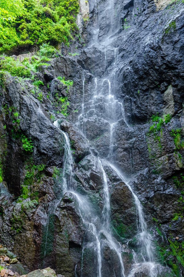 Waterfall in Deep Mountain with Large Rocks in Spring Stock Image ...