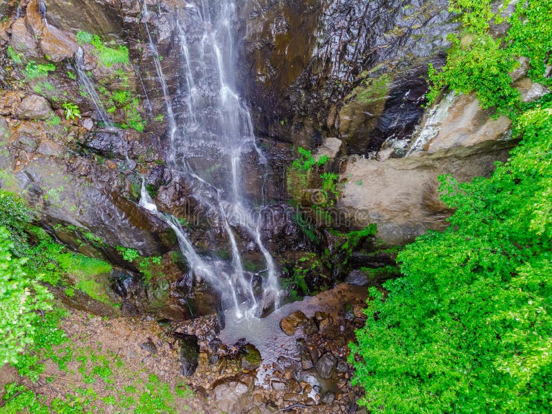 Waterfall in Deep Mountain with Large Rocks in Spring Stock Photo ...