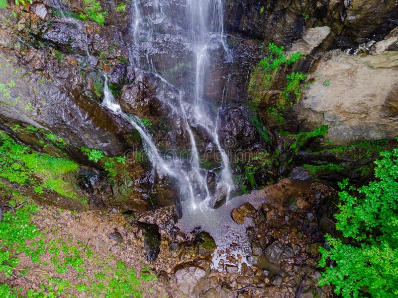 Waterfall in Deep Mountain with Large Rocks in Spring Stock Image ...