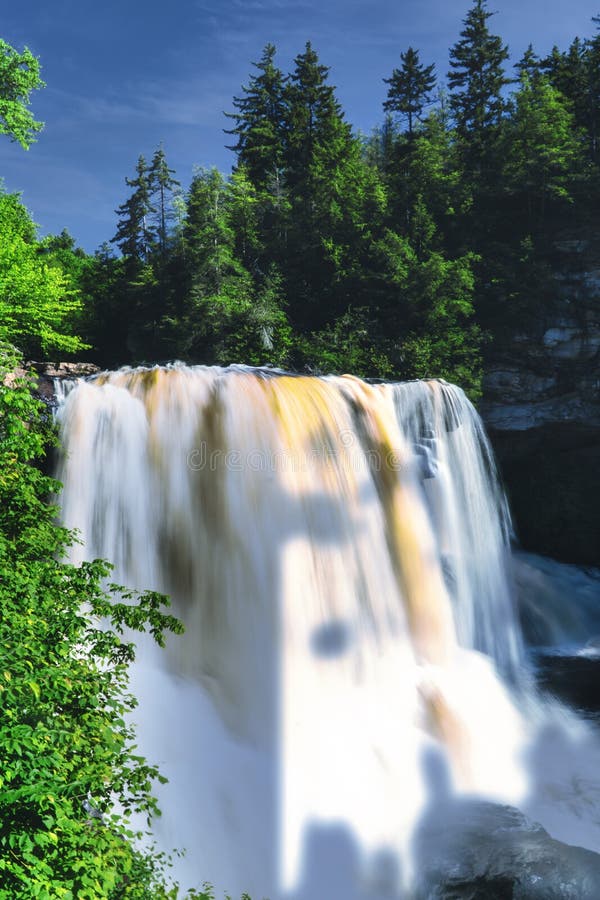 Waterfall with Dirty Water and Green Trees Stock Image - Image of ...