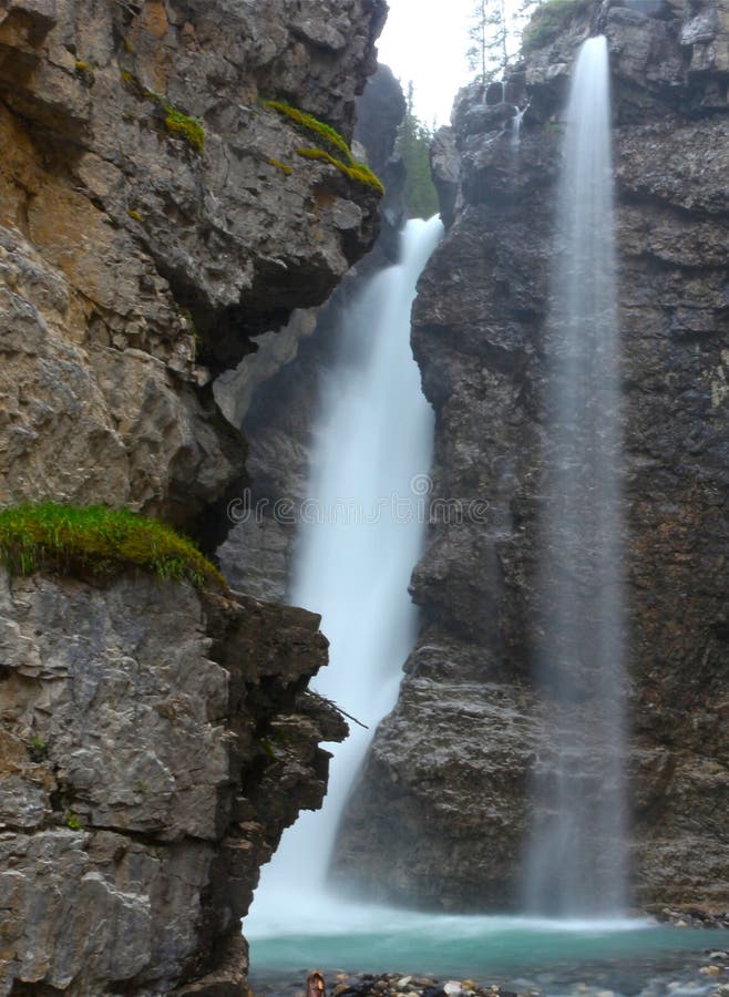 Waterfall Down Rock Cliffs stock photo. Image of long - 33782372