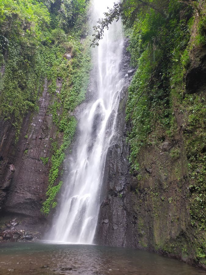 The Waterfall with the Drizzle Invites Stock Photo - Image of cliff ...