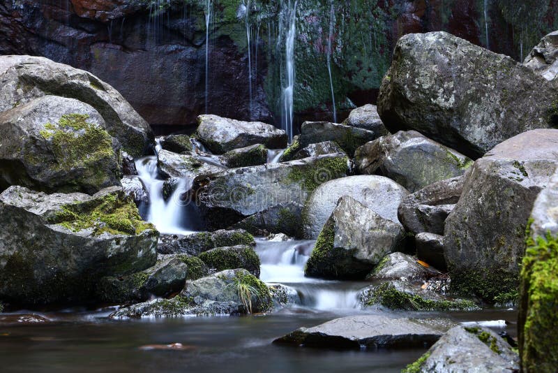 Waterfall Dropping on a Rocky Stream Stock Image - Image of waterfall ...