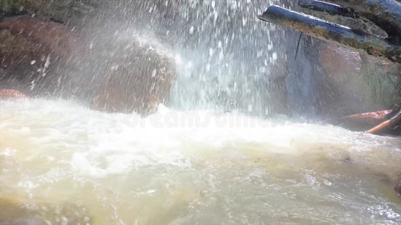 Waterfall Drops on the Rocks and Flows To the Surface of the River ...
