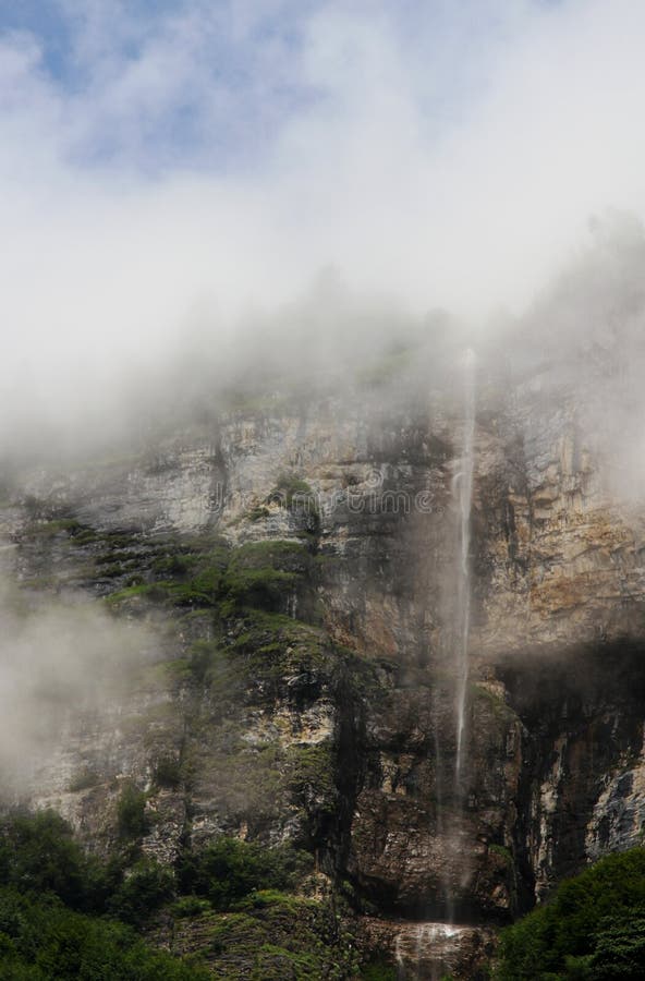 Waterfall that Drops from the Top of the Mountain Stock Photo - Image ...