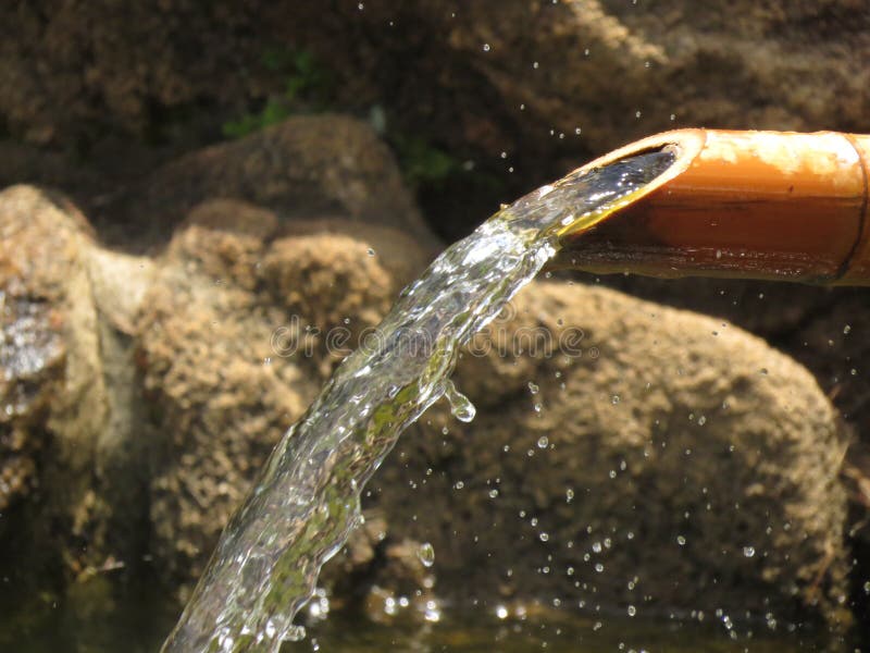 Water Fountain Falling from a Bamboo Pipe Stock Photo - Image of creek ...