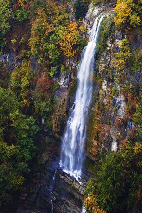 Waterfall Falling Down the Cliff in Autumn Stock Photo - Image of ...