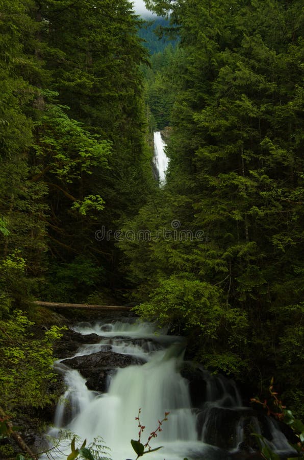 Waterfall Far Off with the Stream Flowing Down Stock Image - Image of ...