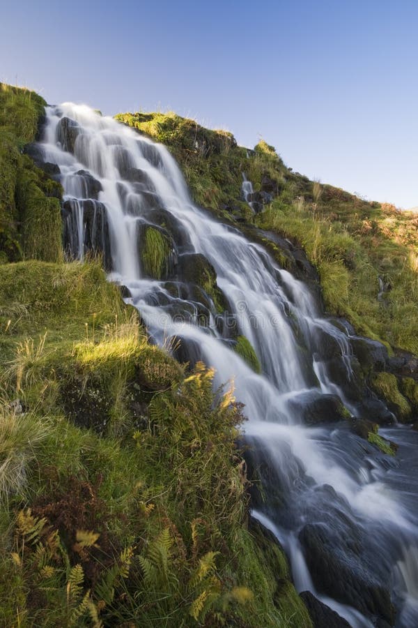 Waterfall Flowing Down Hill with Blue Sky Stock Photo - Image of ...