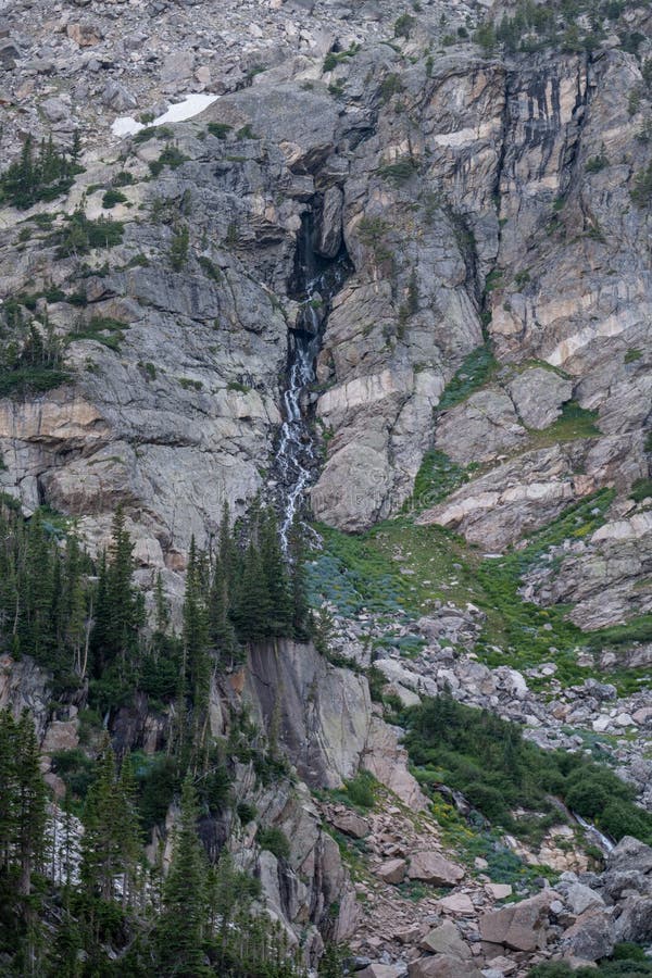 Waterfall Flowing Down a Mountain in Rocky Mountain National Park Stock ...
