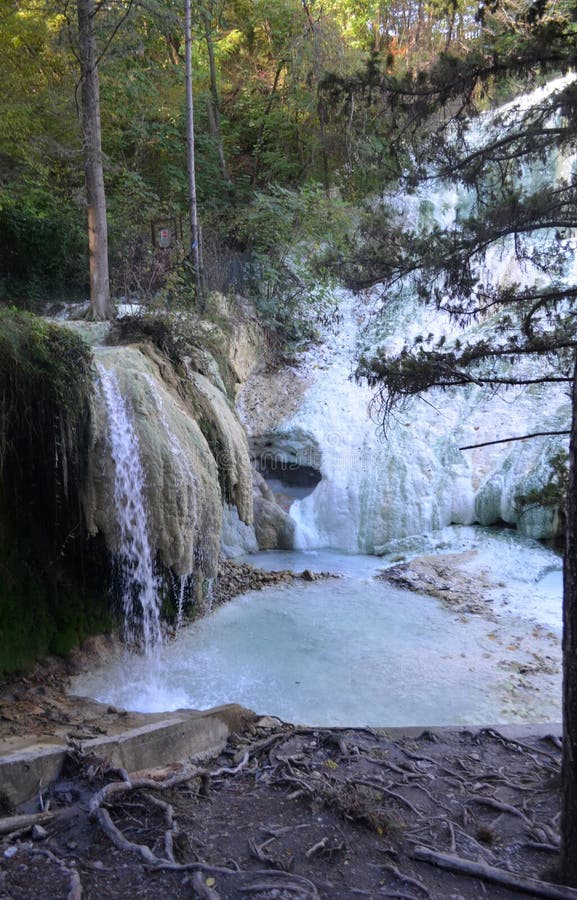 Waterfall Flowing into a Geothermal Hot Spring in Italy Stock Photo ...