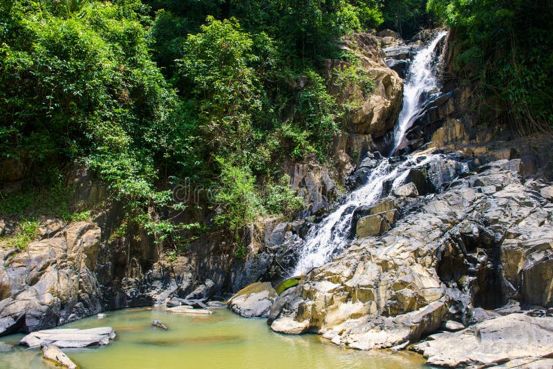 Waterfall Flowing Over Rocks Stock Photo - Image of forest, rocks: 94051638
