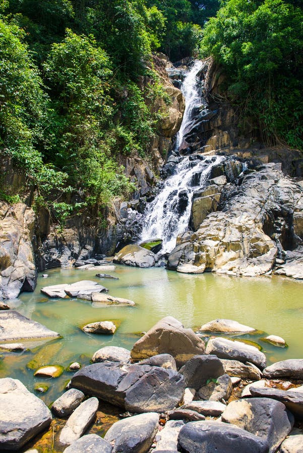 Waterfall Flowing Over Rocks Stock Photo - Image of peaceful, freshness ...