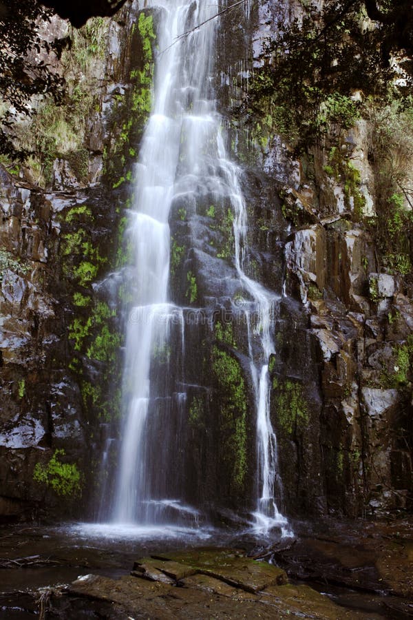 Waterfall Flowing Over Rocks Stock Image - Image of peaceful, nature ...