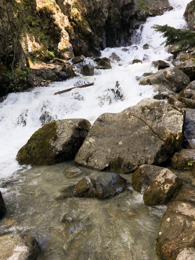 The Waterfall Flowing Over Rocks Stock Photo - Image of water, rocks ...