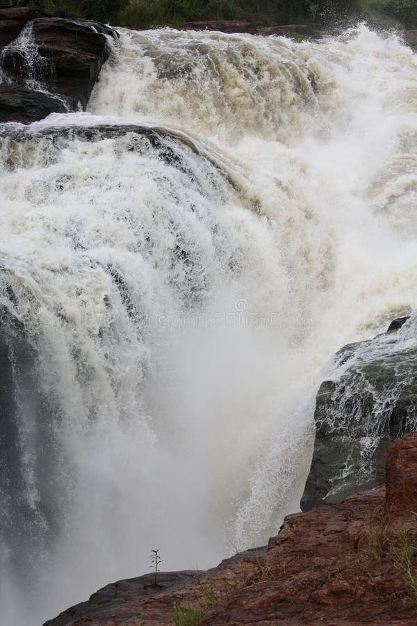 A Waterfall Flowing into a River Stock Image - Image of victoria, rock ...