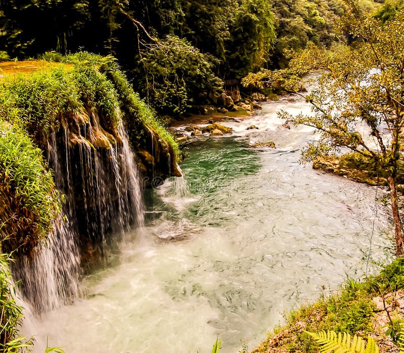 A Waterfall is Flowing into a River Stock Image - Image of calm, nature ...