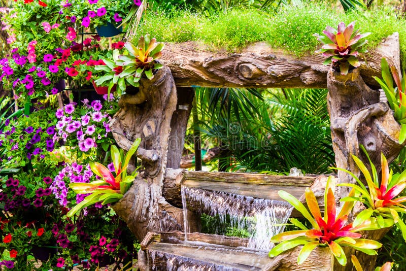 Waterfall Flows in Cozy Home Flower Garden Stock Image - Image of fresh ...