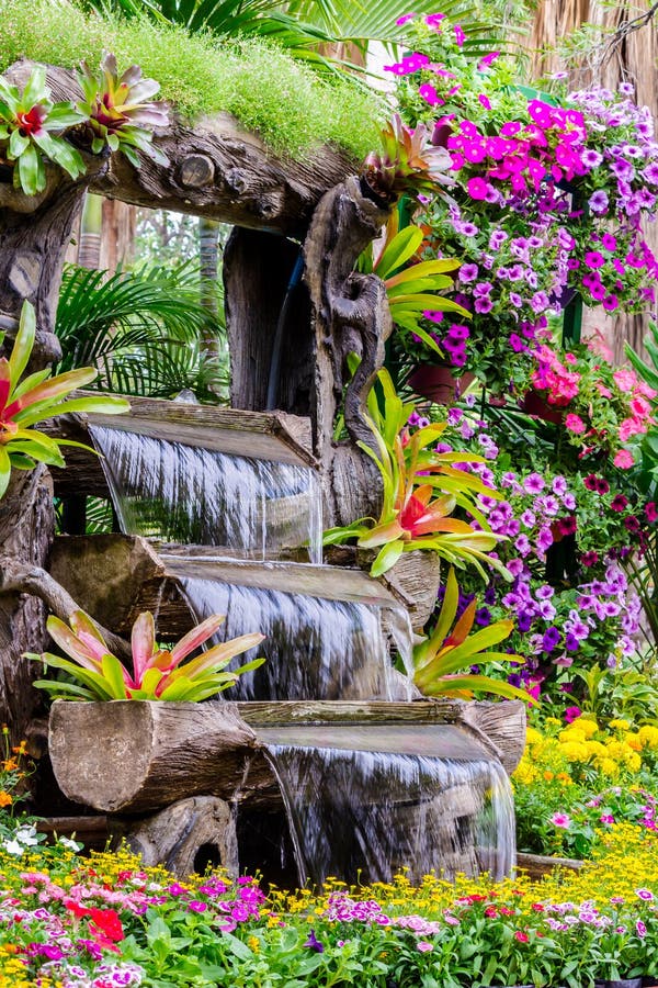 Waterfall Flows in Cozy Home Flower Garden Stock Image - Image of fresh ...