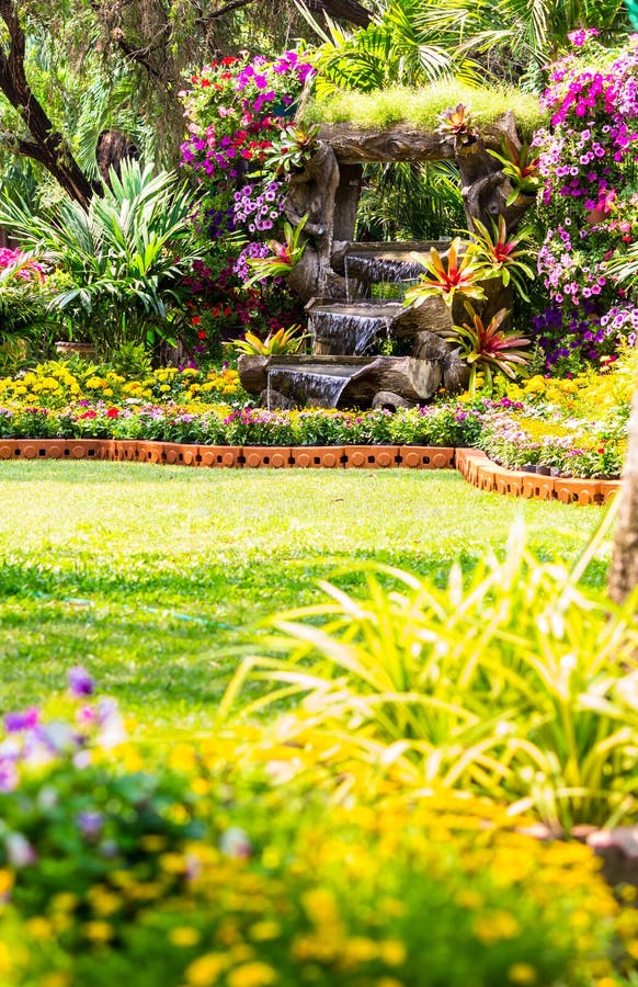 Waterfall Flows in Cozy Home Flower Garden Stock Image - Image of house ...