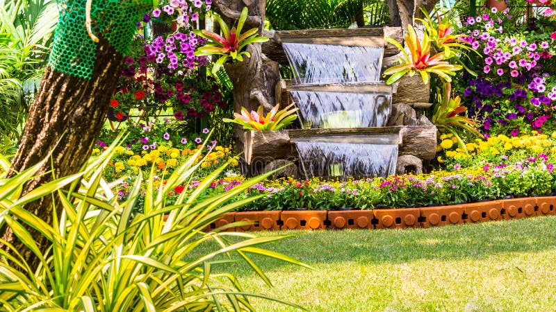 Waterfall Flows in Cozy Home Flower Garden Stock Image - Image of green ...