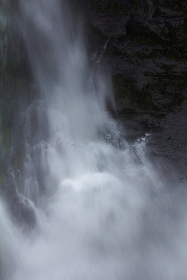 Waterfall Flows Down the Long Line of Cliffs Stock Photo - Image of ...