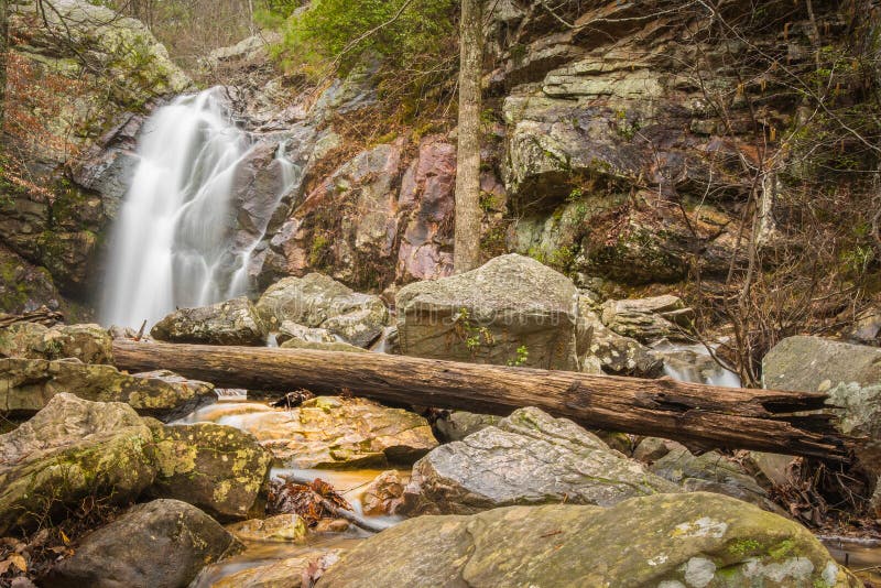 A Waterfall Flows after a Rain in a Hidden Canyon on a Mountain Stock ...