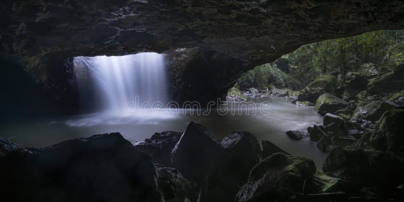 Natural Bridge waterfall stock image. Image of landscape - 214983139