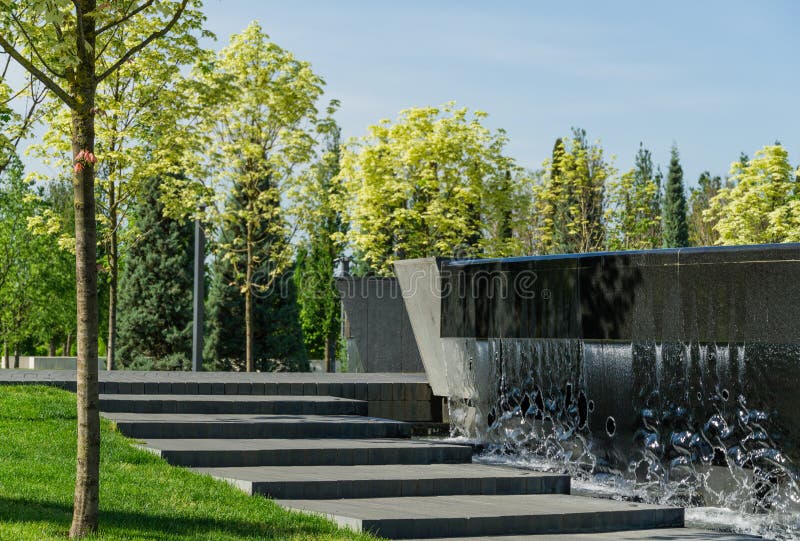 Waterfall Flows in Streams into Granite Bed of Artificial River ...