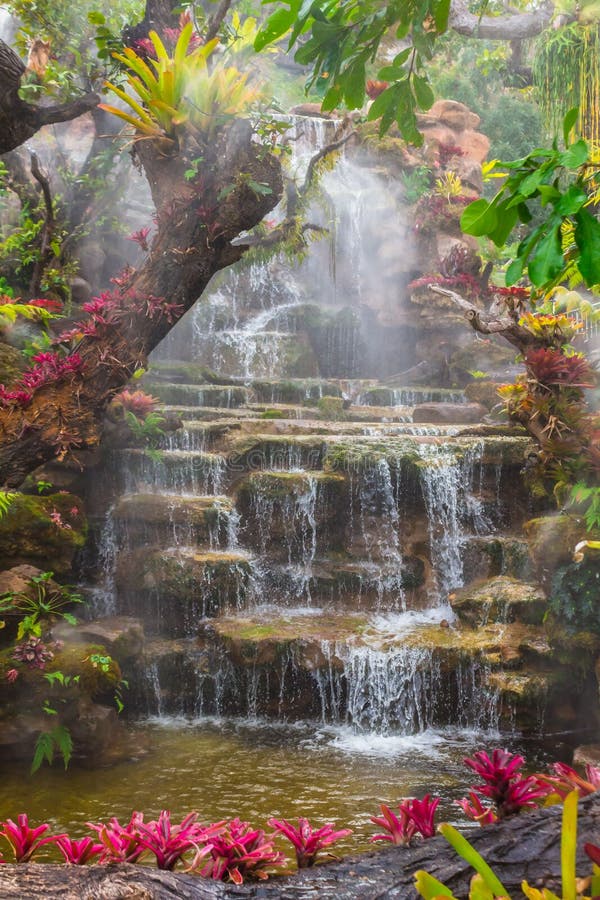 Waterfall Flows through Wet Garden Stock Image - Image of damp, floral ...