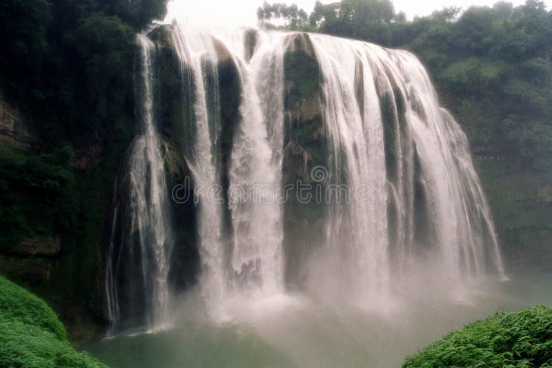 The Waterfall in fog stock photo. Image of great, cliff - 4343908