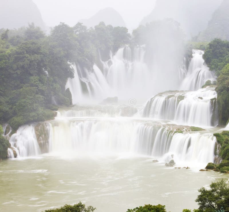 The waterfall in fog stock photo. Image of destination - 9865102