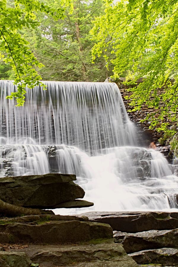 Waterfall in Forest by Rocks Stock Photo - Image of summer, rocks ...