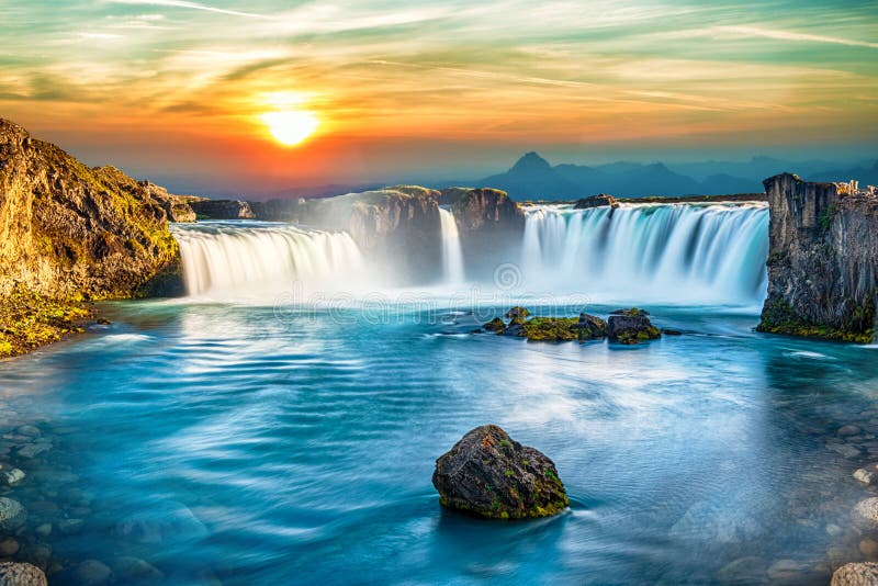 Waterfall in Forest with Sunset and Mountains Stock Photo - Image of ...