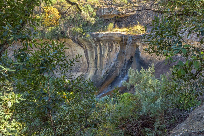 Waterfall, Framed by Tree Leaves on the Clarens Mountain Trai Stock ...
