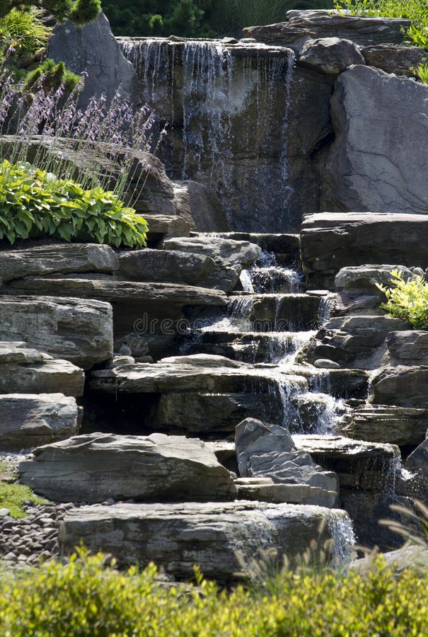 Waterfall in a garden stock image. Image of green, relaxingspot - 36451747