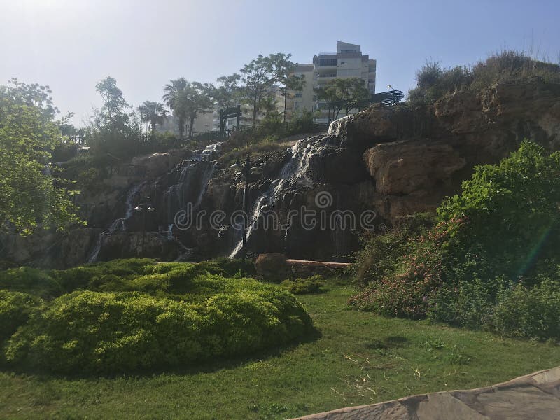 Waterfall and grass stock photo. Image of waterfall - 114711772