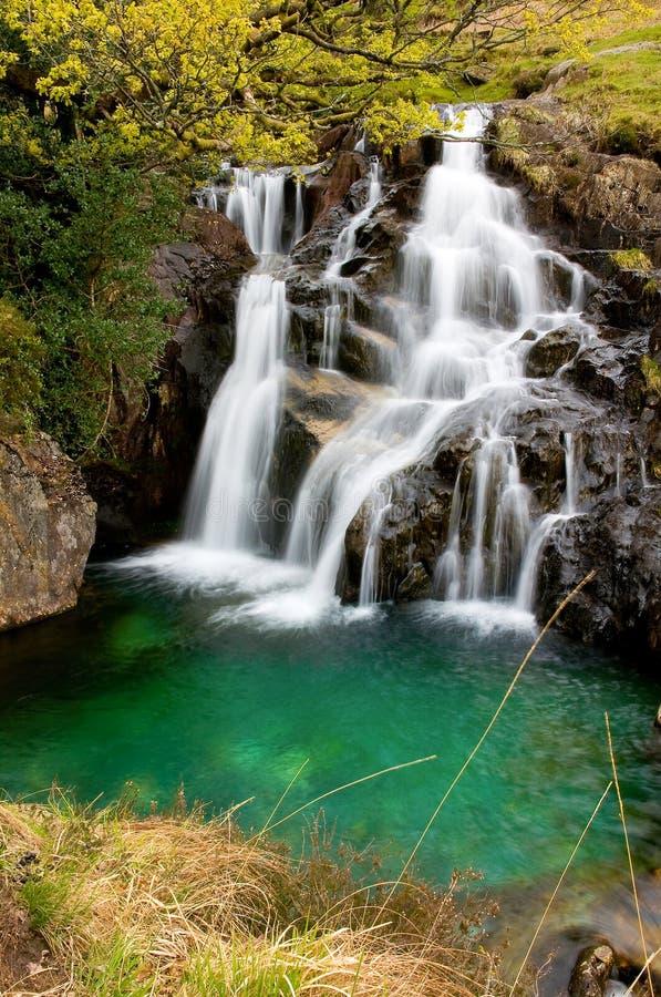 Waterfall and green pool stock photo. Image of mountain - 24867062