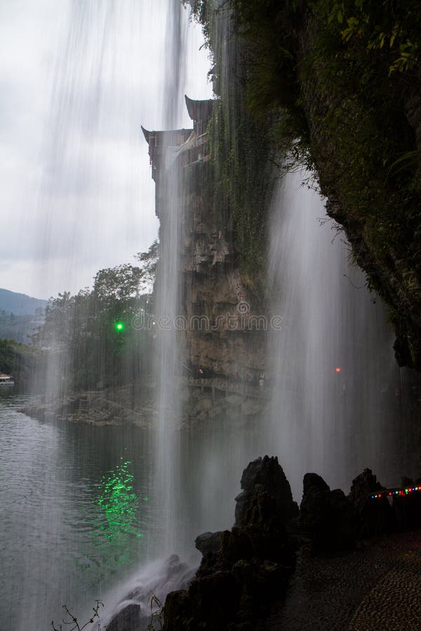 Waterfall hanging on cliff stock photo. Image of waterfall - 51733240