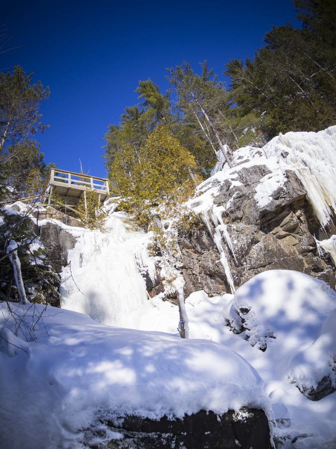 Waterfall with Ice and Snow Stock Image - Image of sunny, winter: 70202257