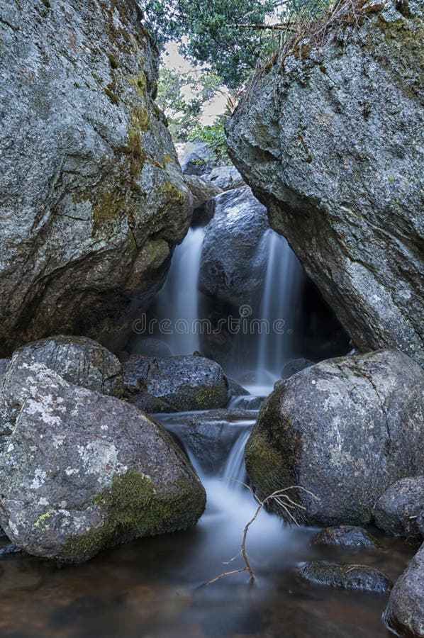 Waterfall Inside a Cave - Vertical Stock Image - Image of mystical ...